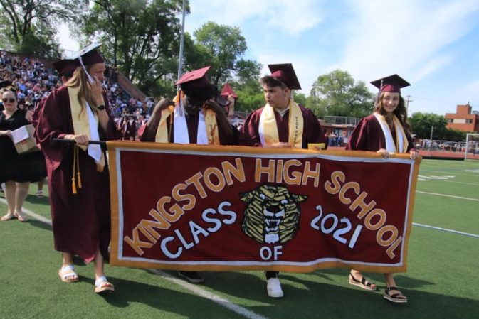 Kingston grads cap a challenging year with large in-person graduation ...